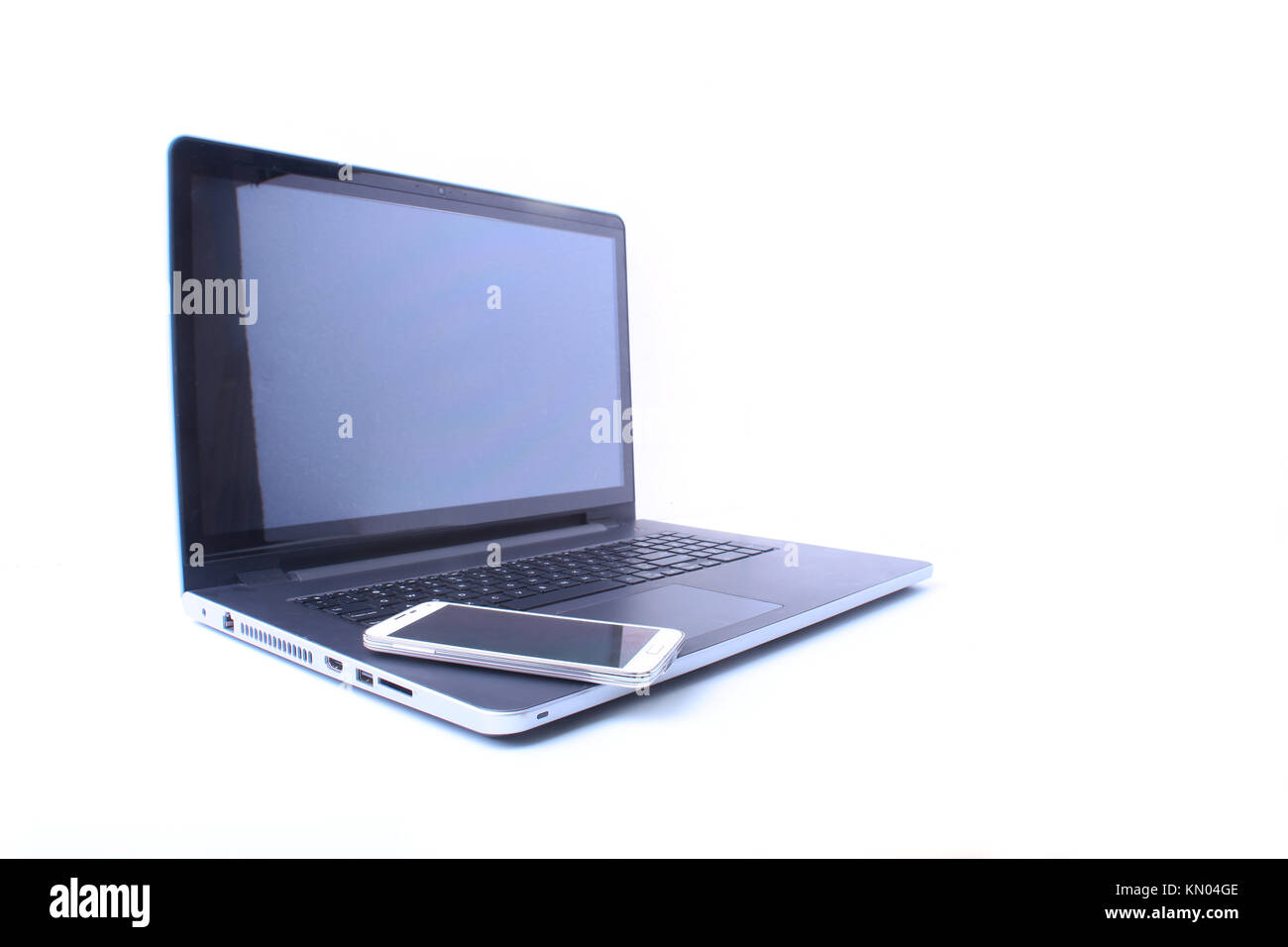 Workplace desk computer smartphone Cut Out Stock Images & Pictures - Alamy