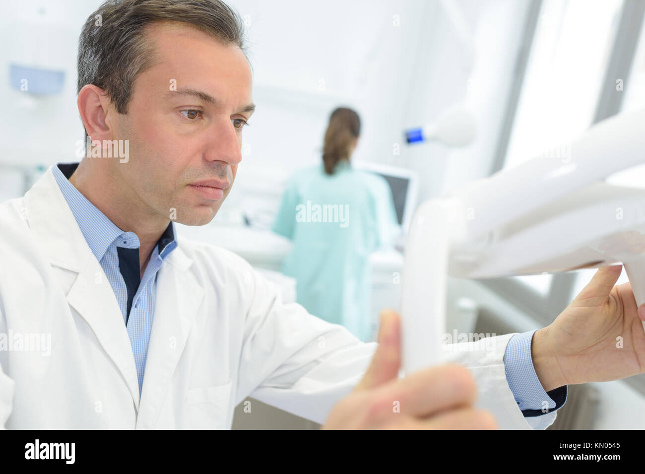 male doctor working with x-ray machine Stock Photo - Alamy