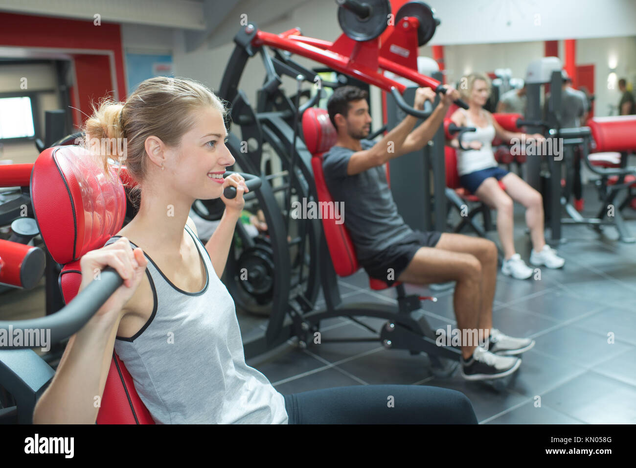 group of people training in gym Stock Photo - Alamy