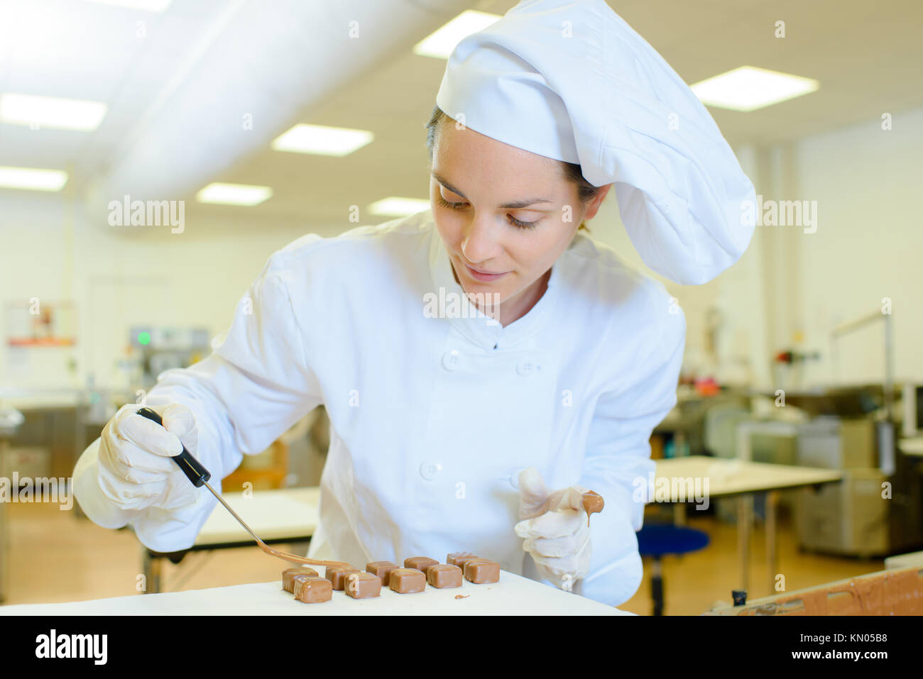 adding the topping Stock Photo - Alamy