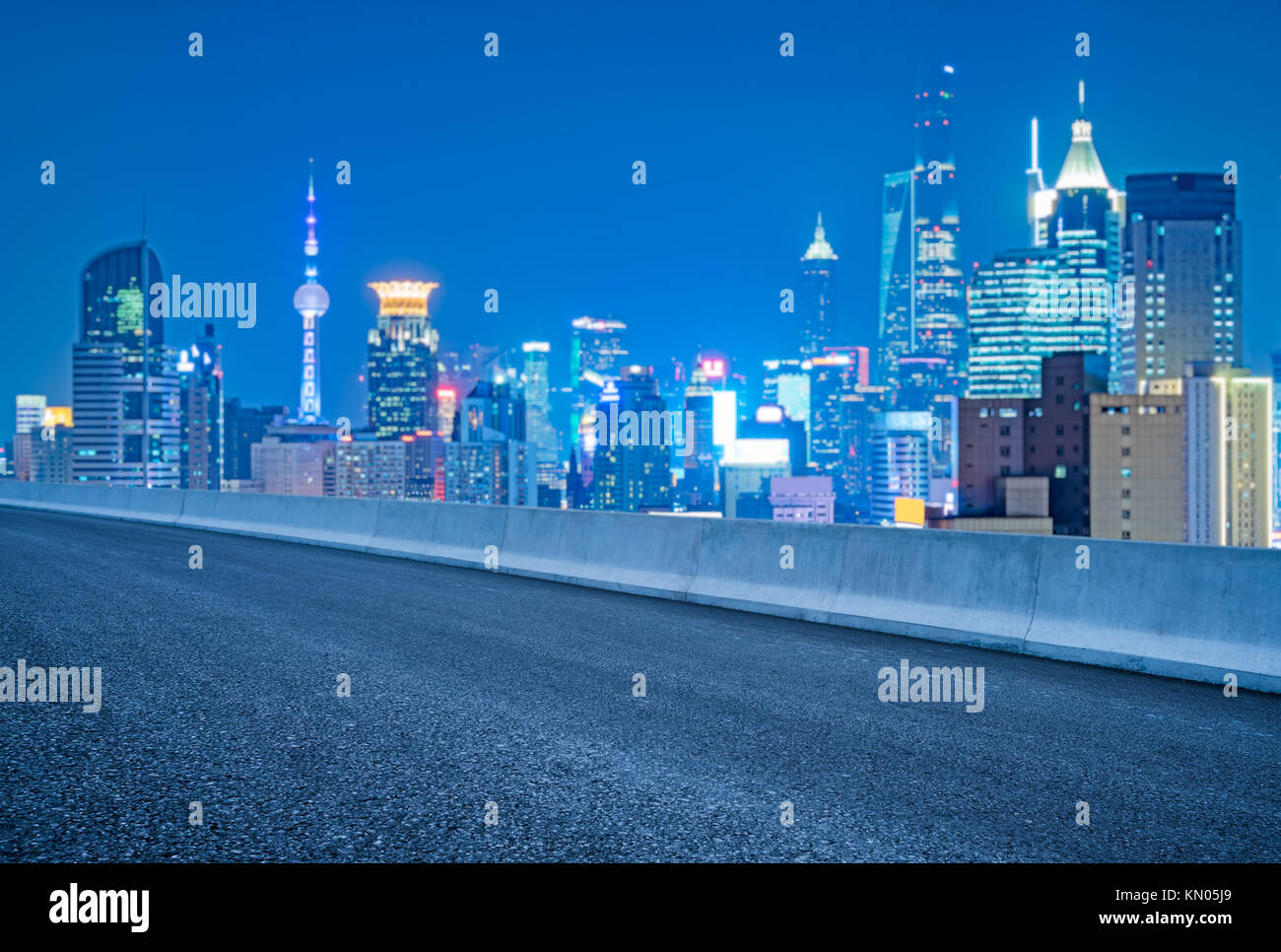 empty asphalt road through modern city in China Stock Photo - Alamy
