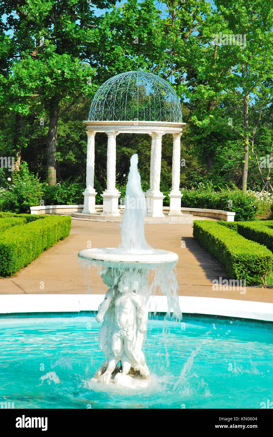Water fountain and pavilion in a European-styled garden. A symbol of ...