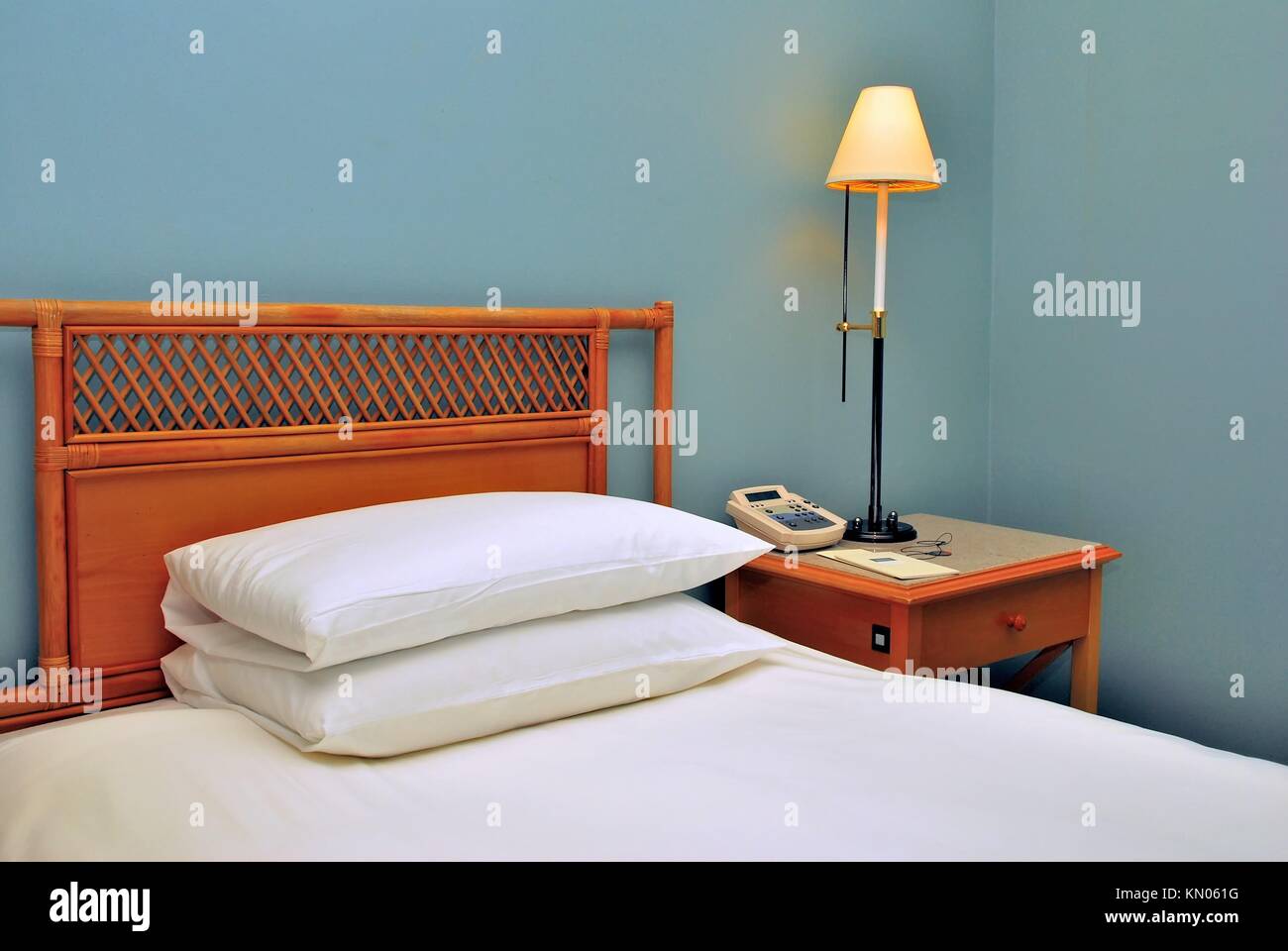 Bedside table and bed in a high class hotel room. Suitable for concepts ...