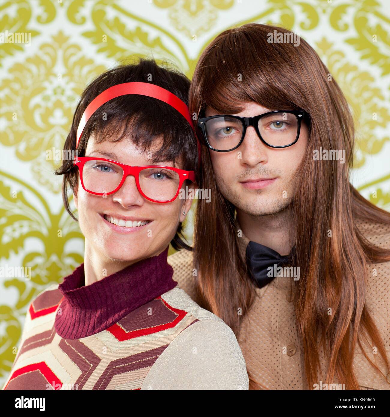 Funny humor silly nerd couple on retro vintage wallpaper background ...