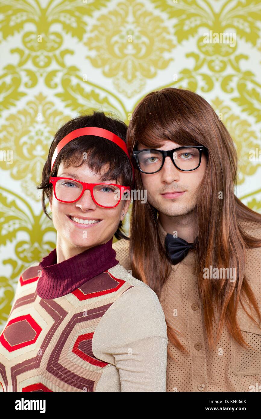 Funny humor silly nerd couple on retro vintage wallpaper background ...