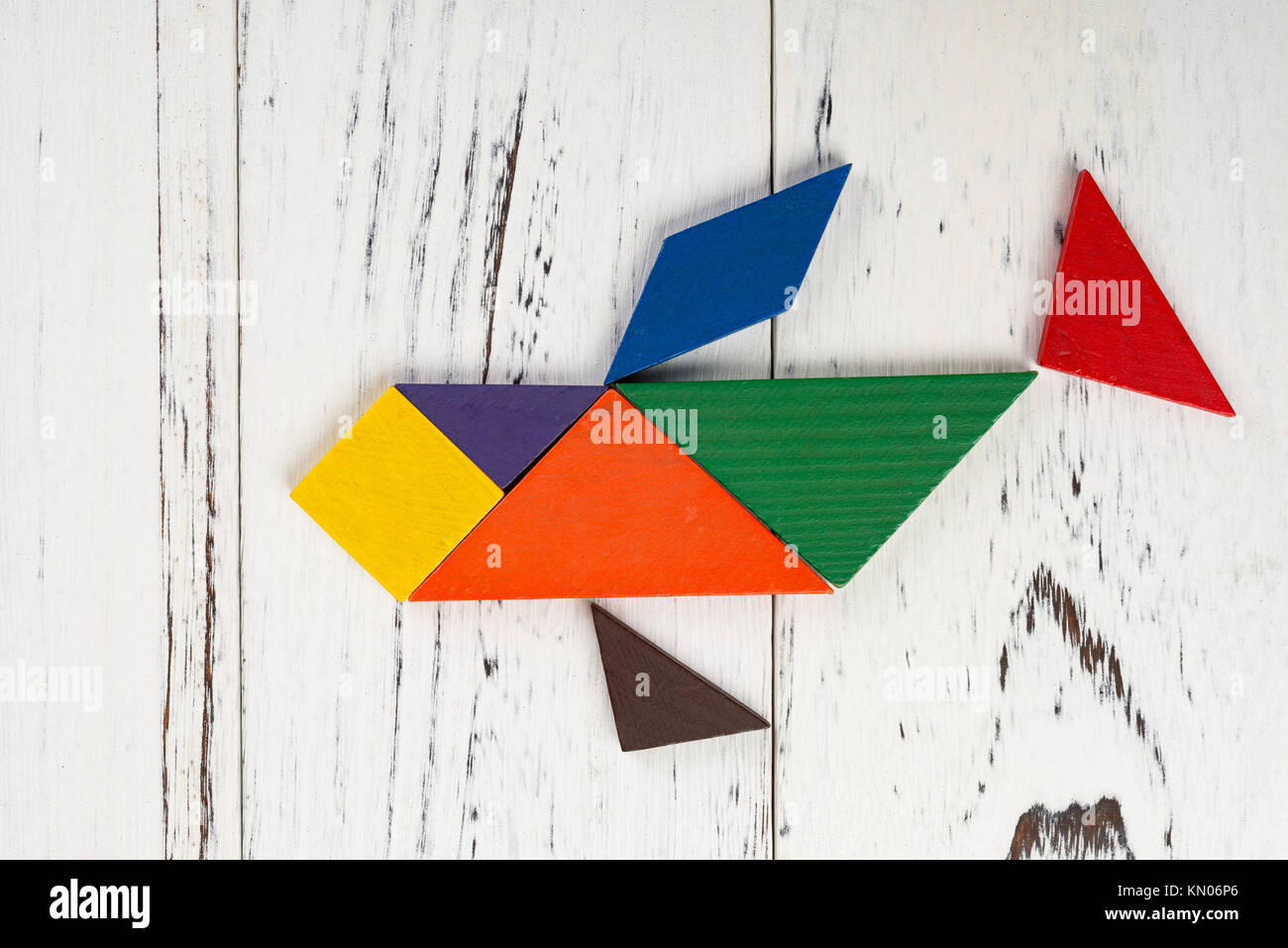 wooden tangram in a dolphin shape Stock Photo - Alamy