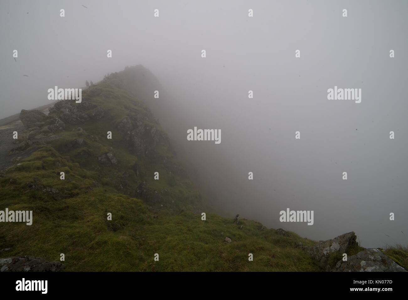 View from the top of Mount Snowdon on a foggy day, (thick fog / mist ...