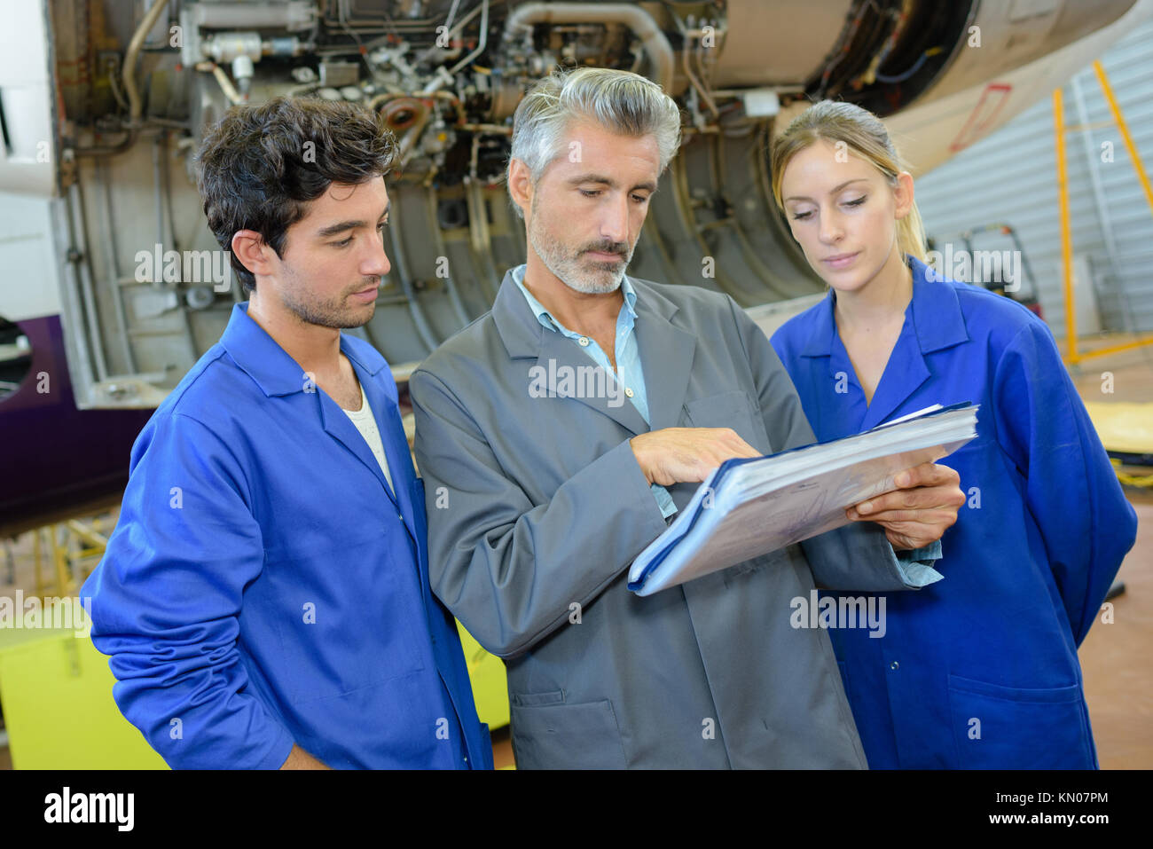teacher with student in metallurgy workshop Stock Photo - Alamy