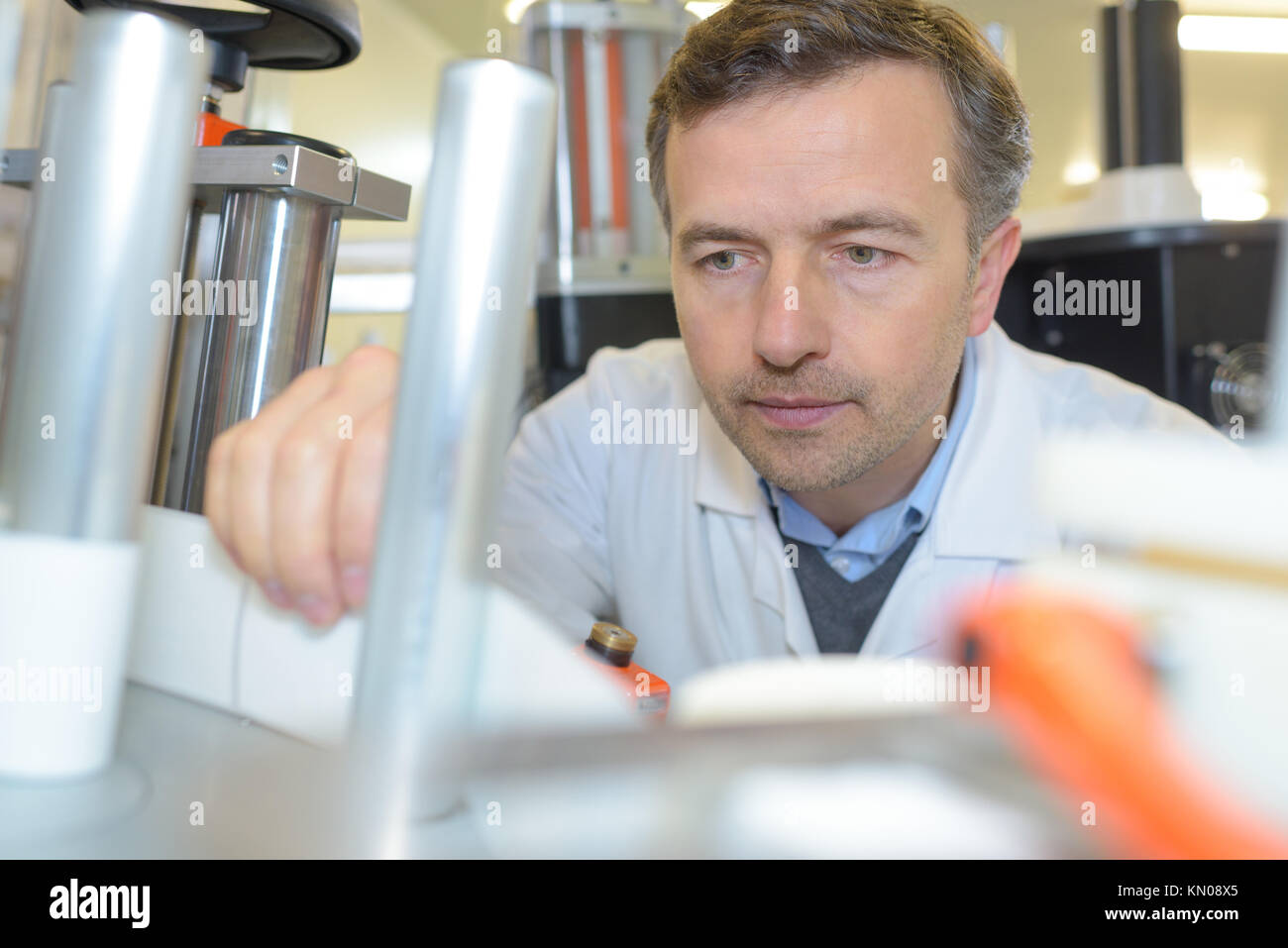 man working on printing machine Stock Photo - Alamy