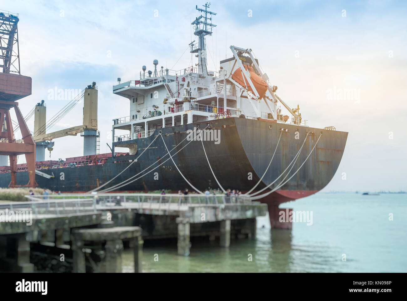 Cargo container ship at harbor Stock Photo - Alamy