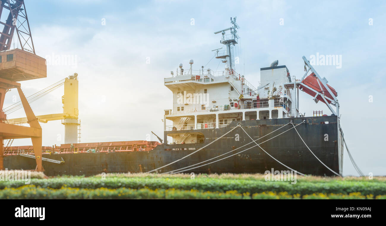 Cargo container ship at harbor Stock Photo - Alamy