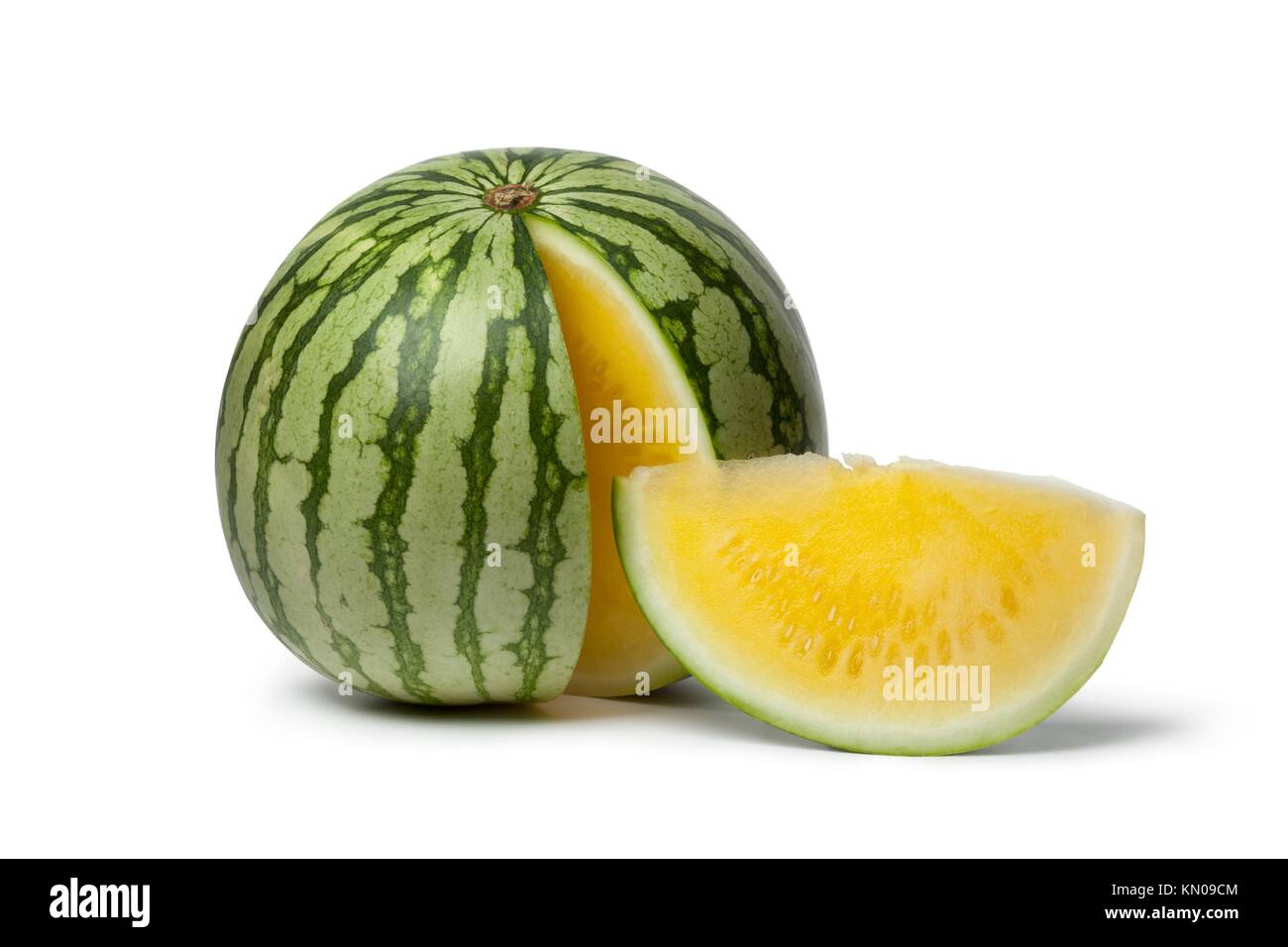 Seedless yellow watermelon on white background Stock Photo - Alamy