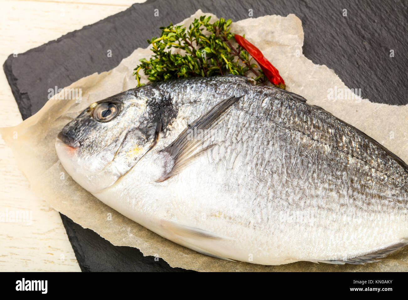 raw dorada fish - ready for cooking Stock Photo - Alamy