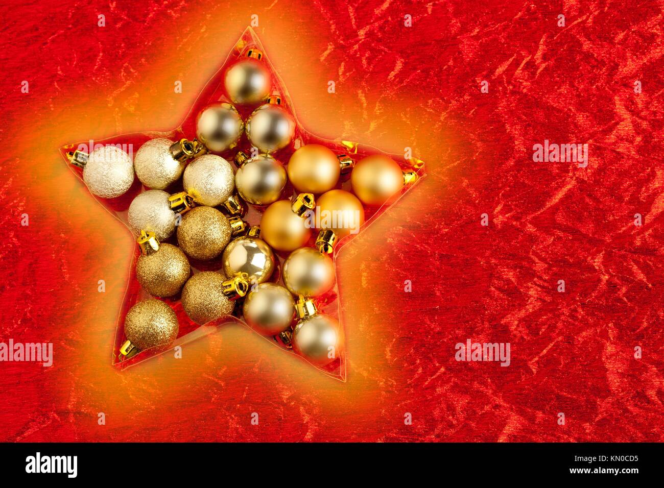 christmas baubles in star shape on red background Stock Photo - Alamy