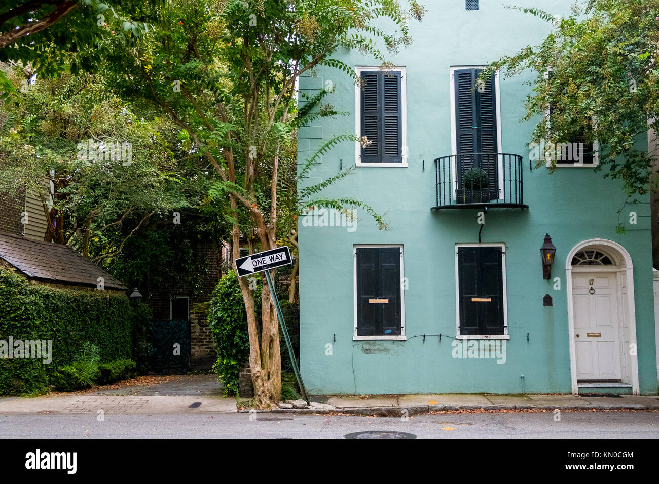 a one way sign in a quiet residential town Stock Photo - Alamy