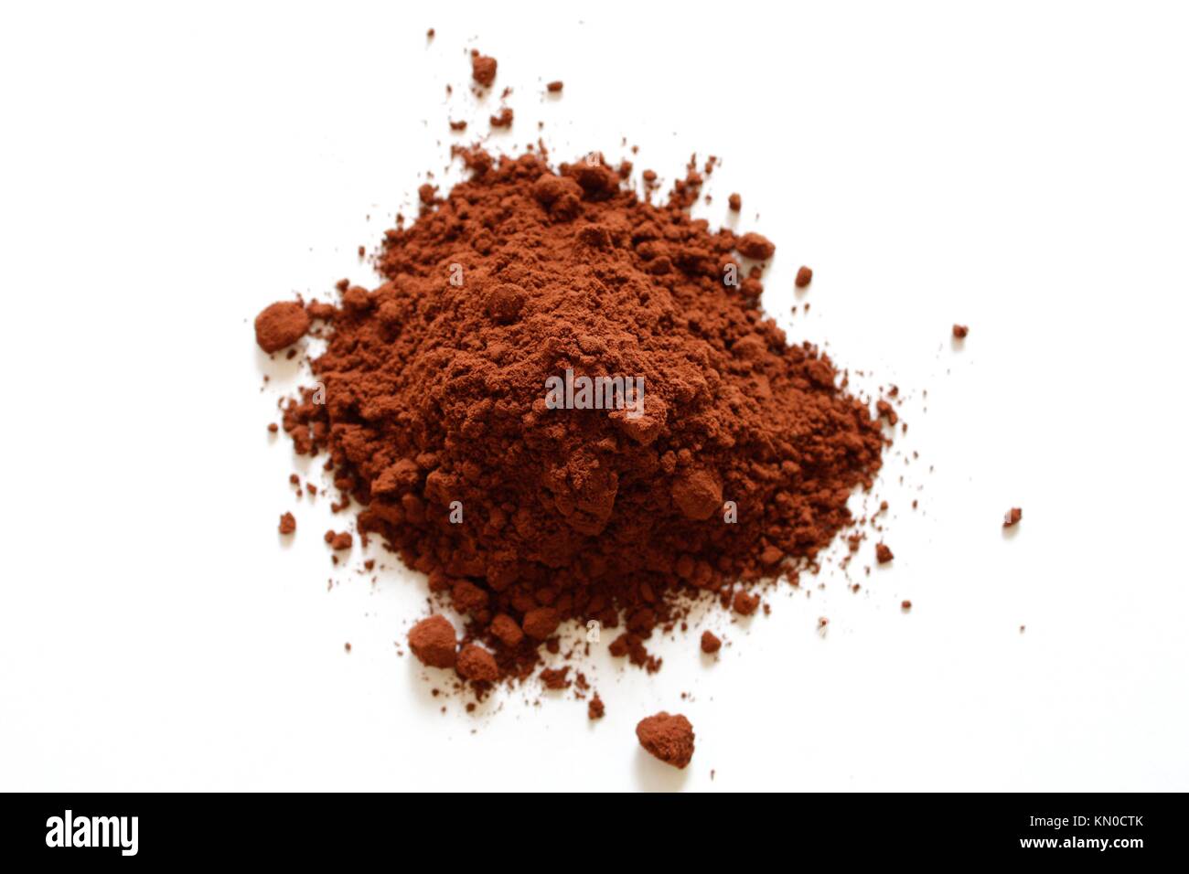Cocoa powder isolated on white Stock Photo - Alamy