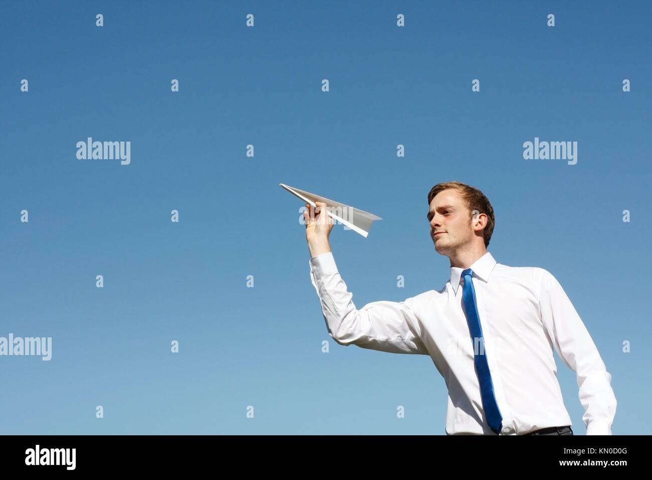 Man throwing paper plane hi-res stock photography and images - Alamy
