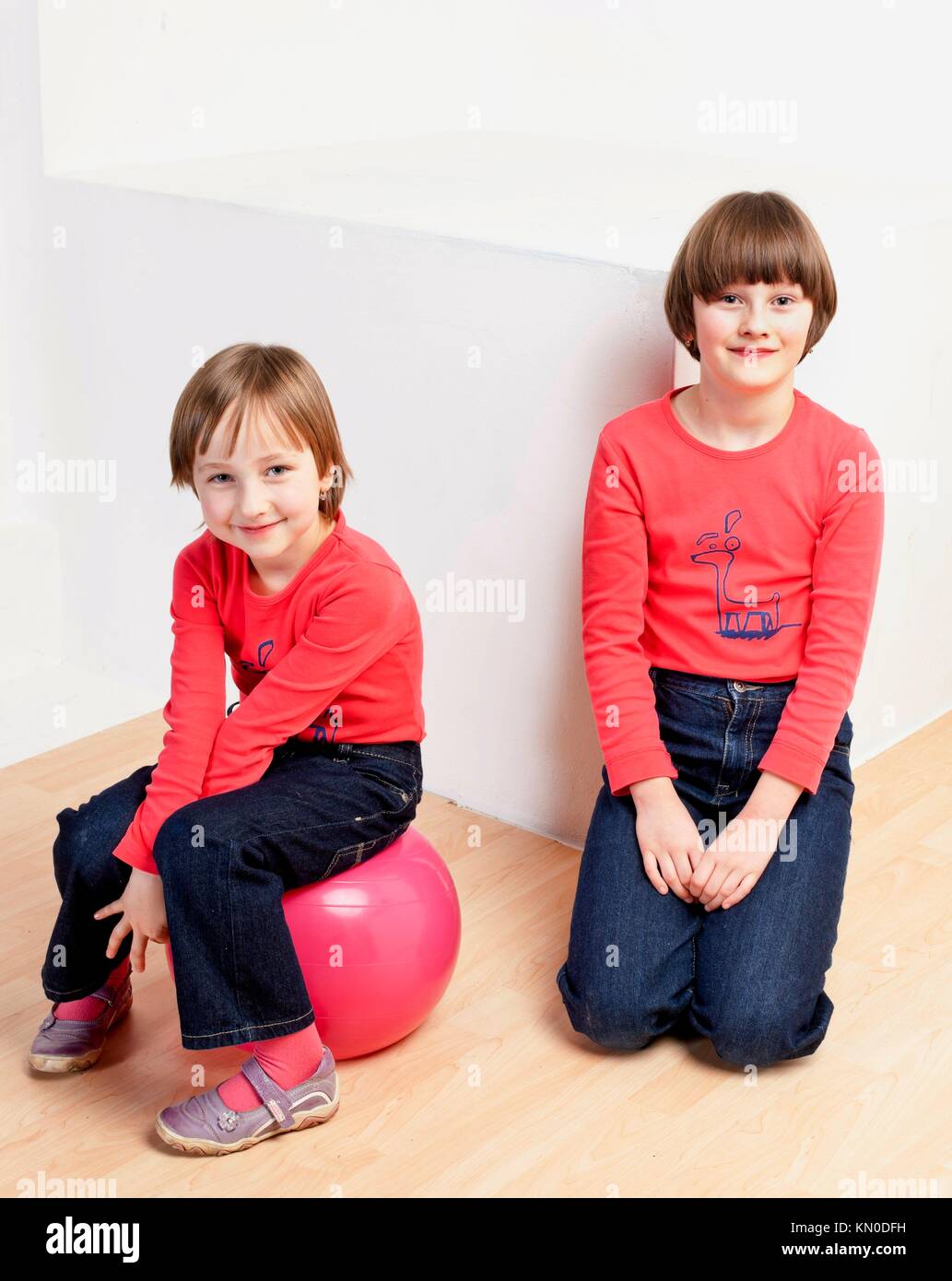 two playing sisters Stock Photo - Alamy