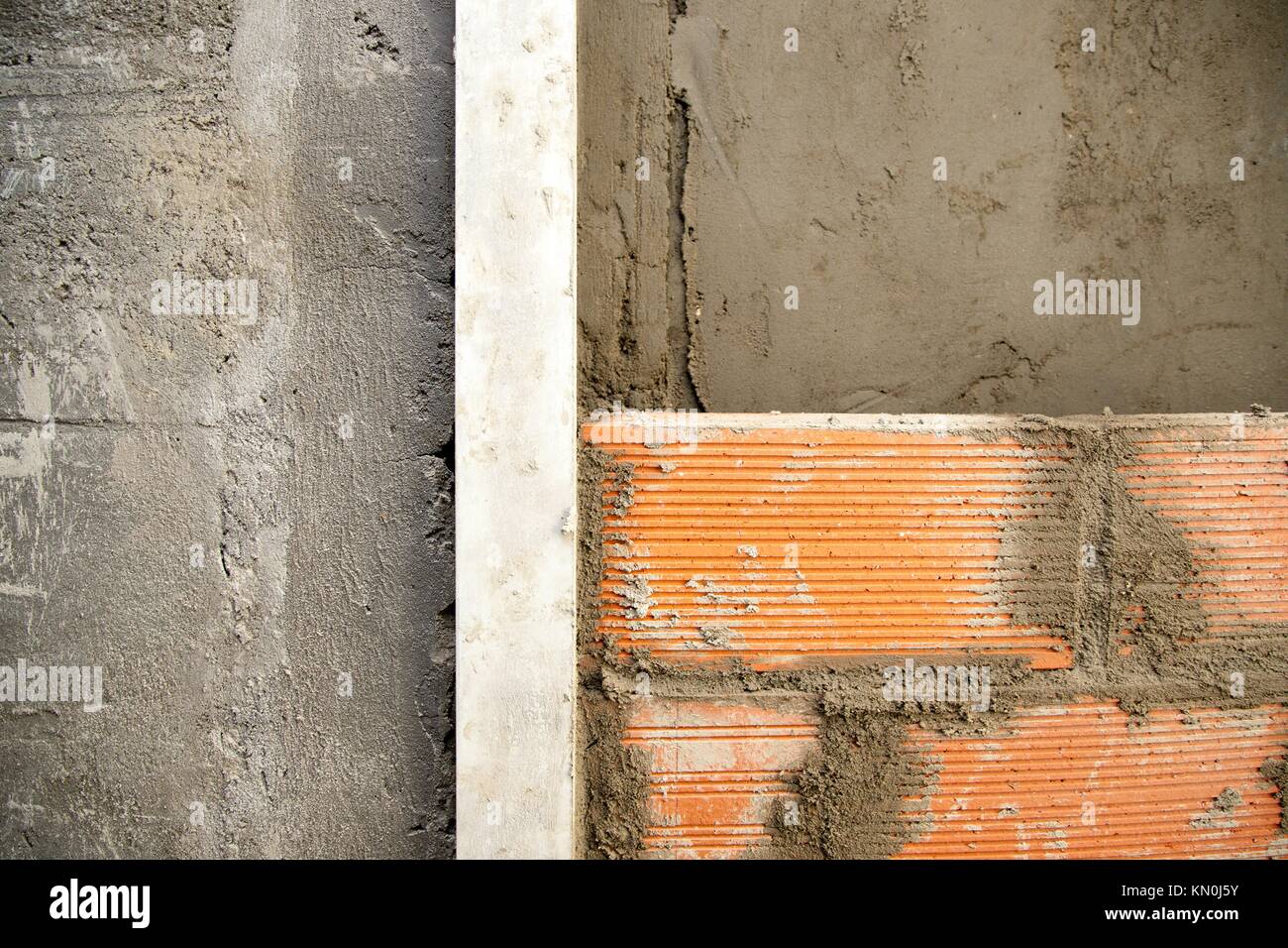 Brickwall construction cement plaster rulers hi-res stock photography ...