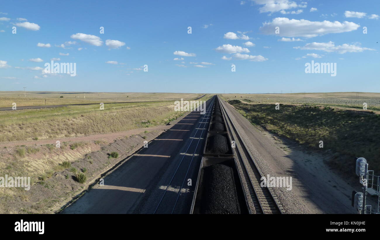 Long train hauling coal through an empty landscape in the Powder River ...