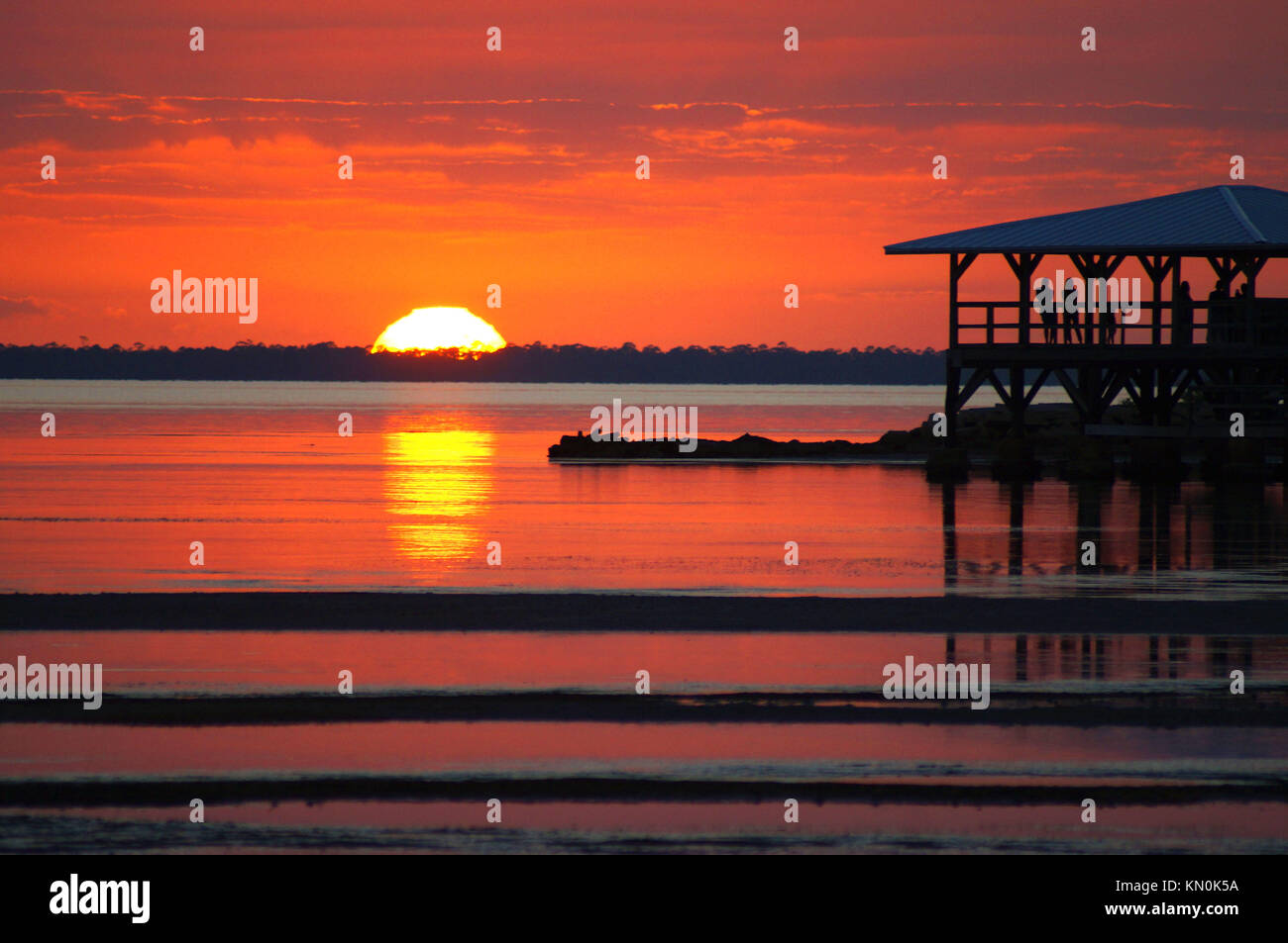 Pier At Sunset Stock Photo - Alamy