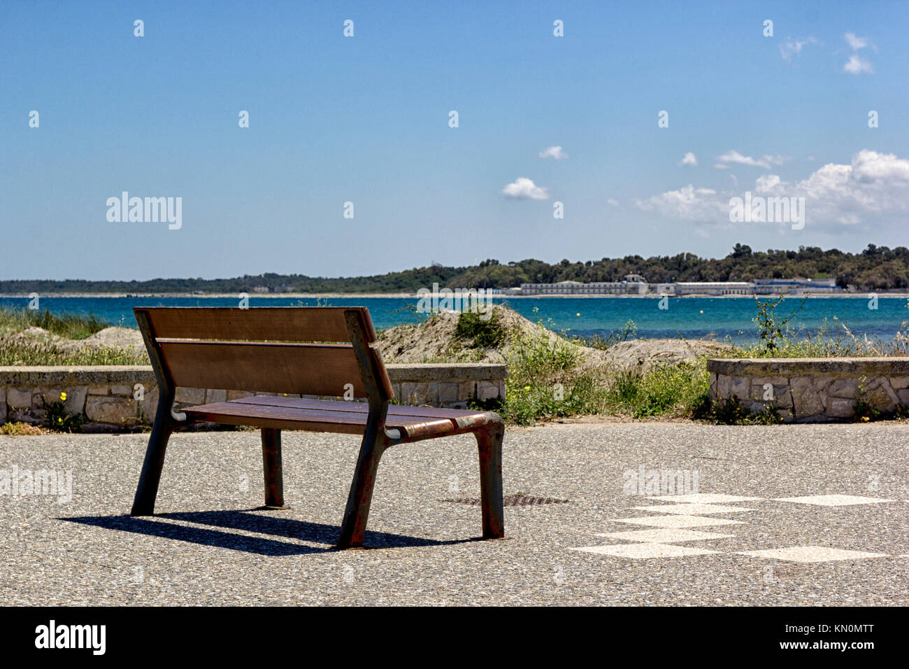 Bench facing the sea of Lecce Stock Photo - Alamy