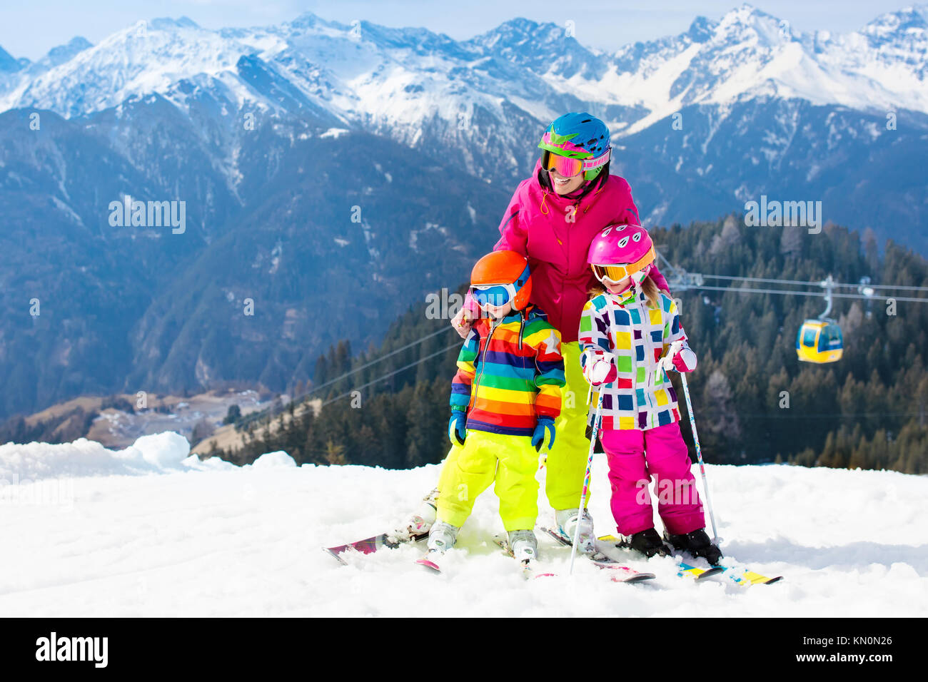 Family ski vacation. Group of young skiers in the Alps mountains ...