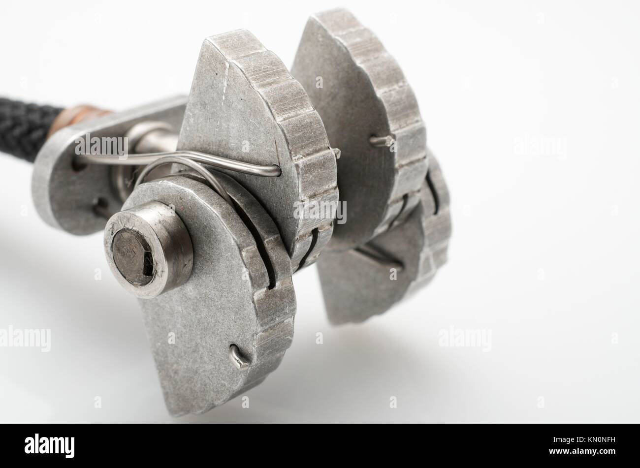 closeup of a friend, equipment used as a method of climbing safety ...