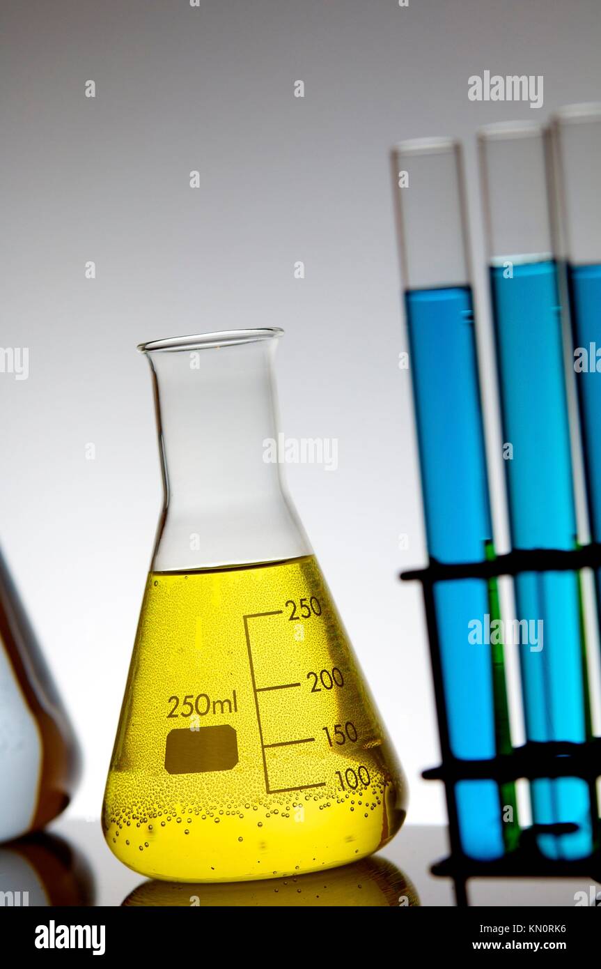 laboratory equipment with multicolor liquid on a white background Stock ...