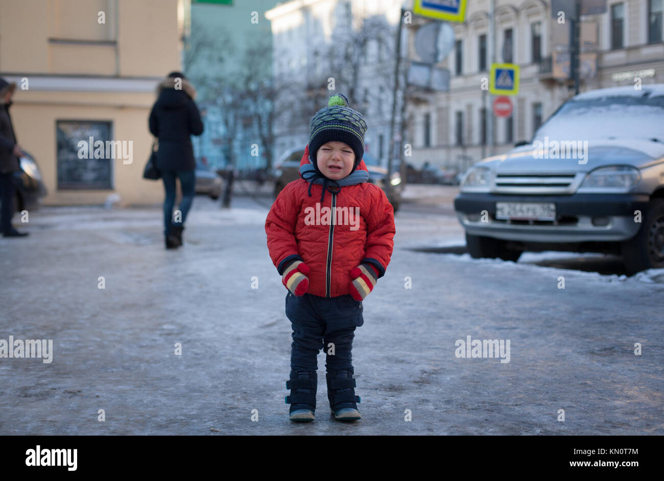 baby crying in the street. offended by the Pope Stock Photo - Alamy