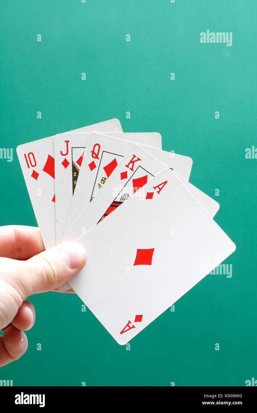 Hand holding a playing card hi-res stock photography and images - Alamy