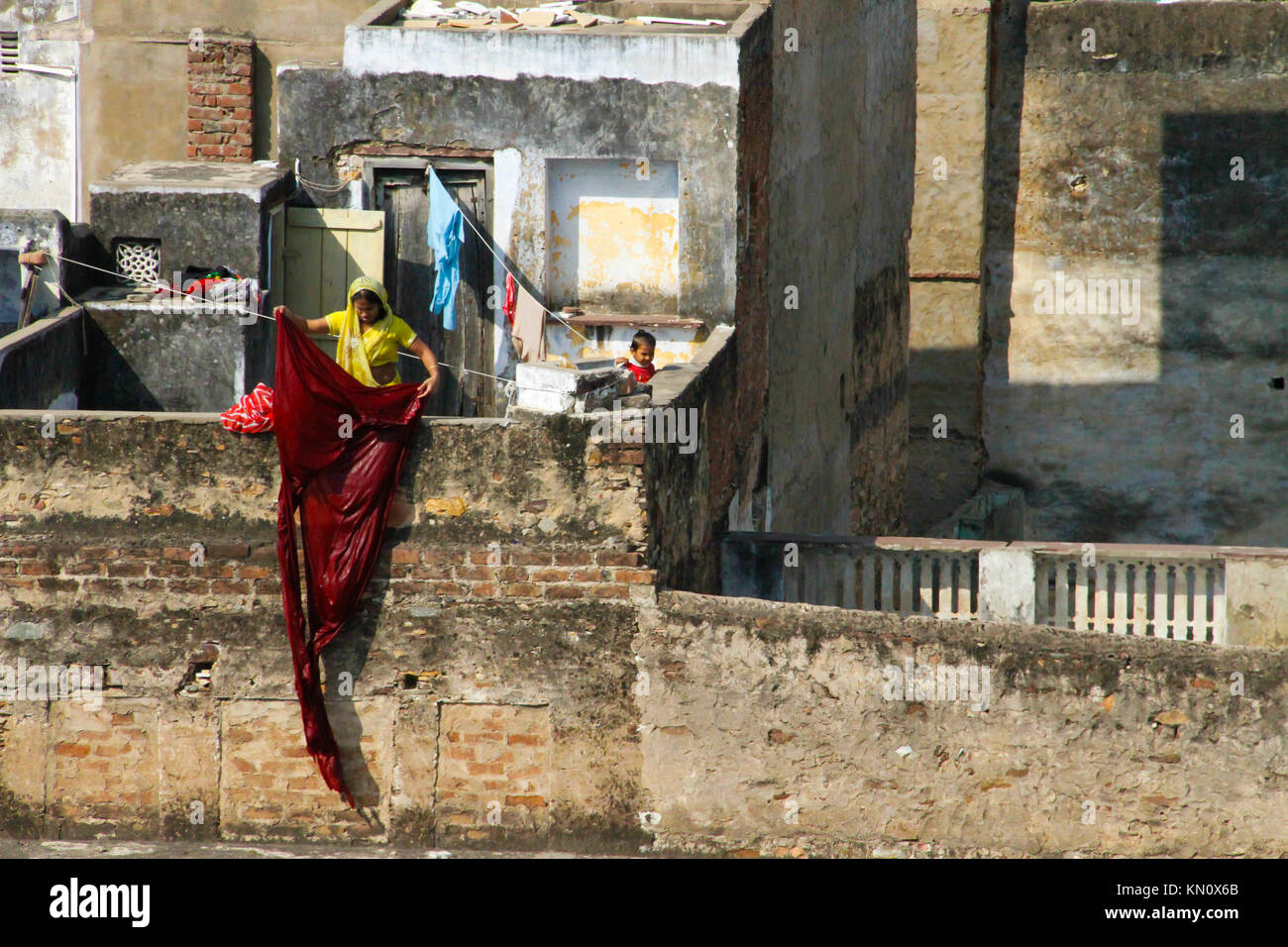 Woman hanging out washing hi-res stock photography and images - Alamy