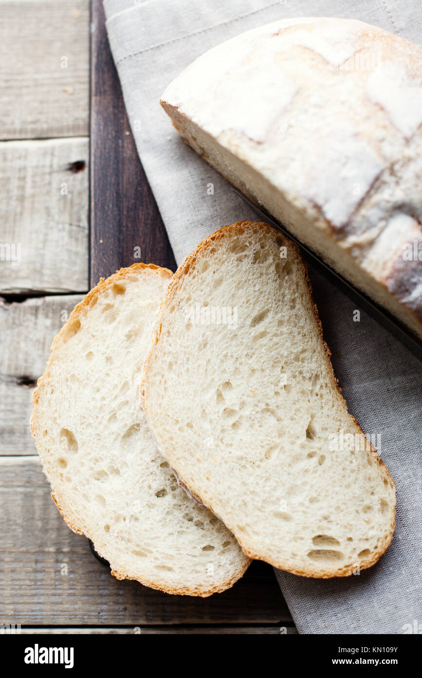 Sliced unleavened bread on a wooden table Stock Photo - Alamy