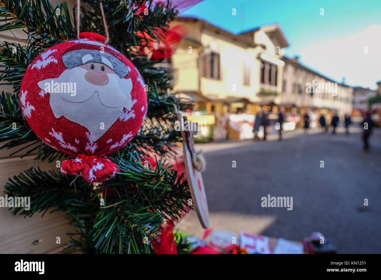 A Christmas decoration is on display at the window of a market stall in ...