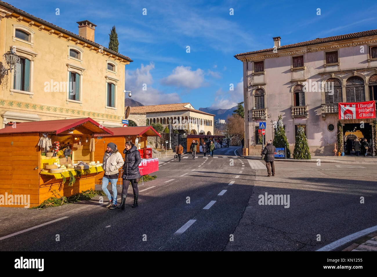 Locals and tourists visit the Christmas markets in the window in ...