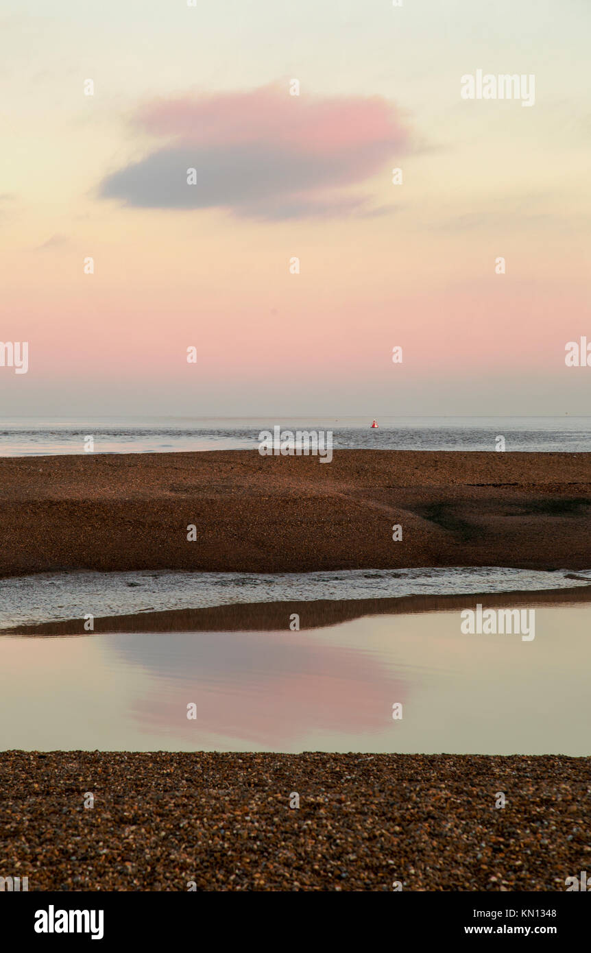 Sunset at the beautiful and unique coastal landscape at Shingle Street ...