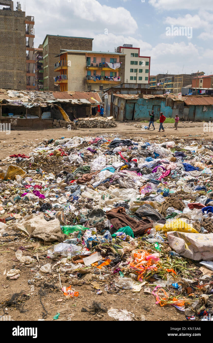 A large pile of plastic and general waste rubbish lies in the middle of ...