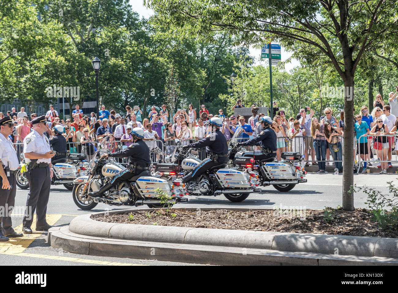 NEW YORK - JULY 10: Police officers drive motorcycles during the parade ...