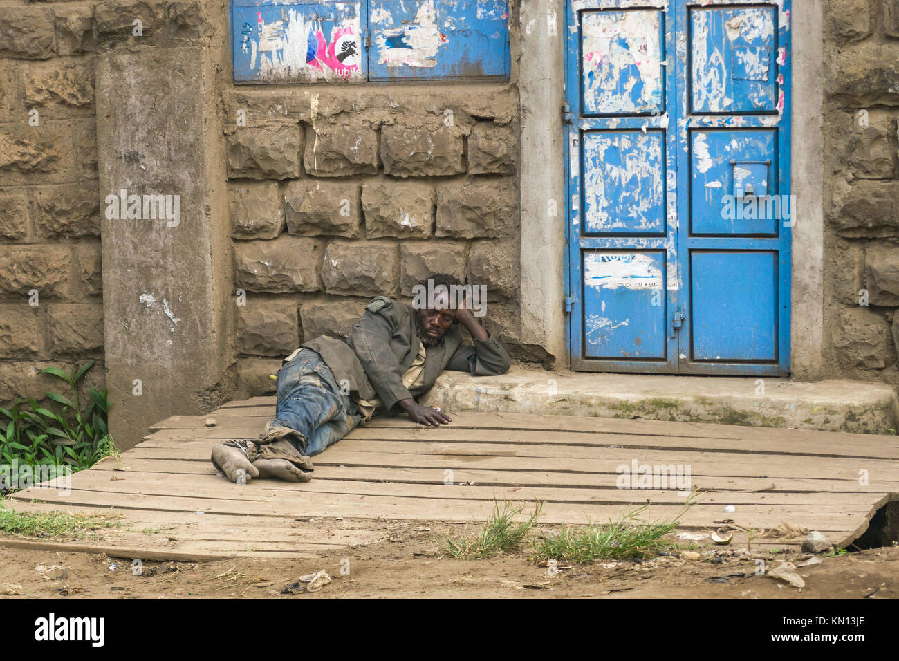 Homeless man rests hi-res stock photography and images - Alamy