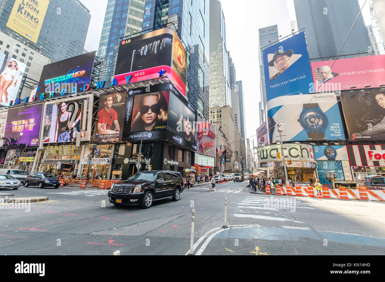 NEW YORK CITY - JULY 22: Undefined people pass through Times Square on ...