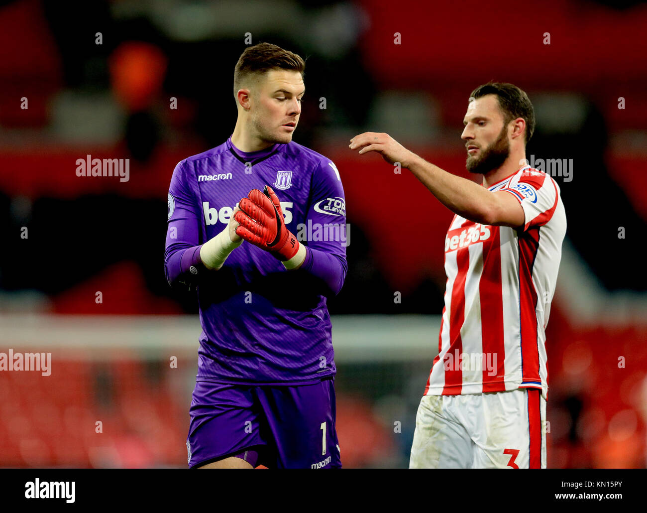 Stoke City goalkeeper Jack Butland (left) and Stoke City's Erik Pieters ...