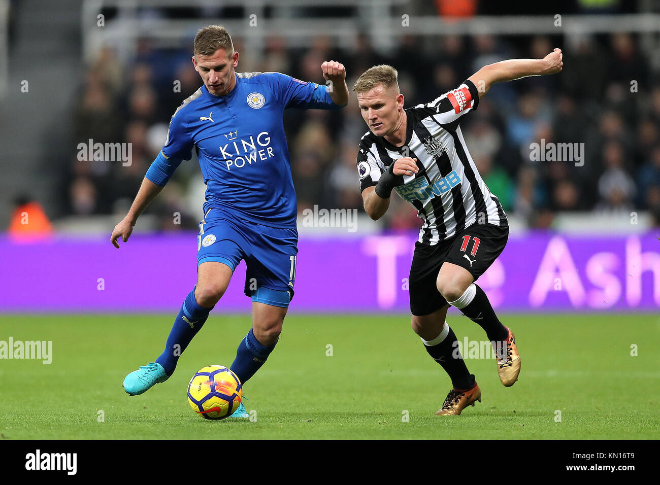 Leicester City's Marc Albrighton (left) and Newcastle United's Matt ...