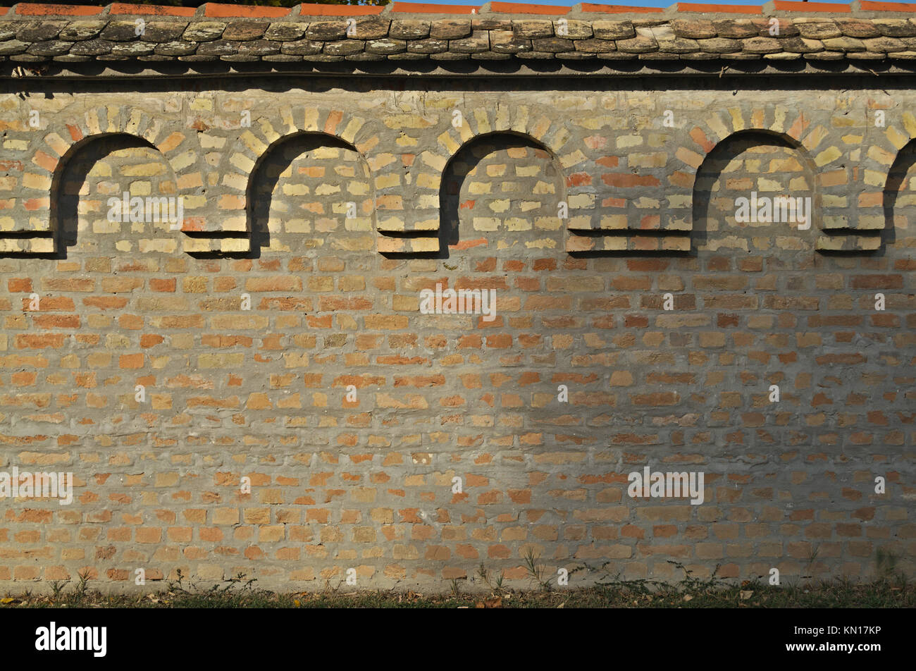 Brick fence with roof pattern texture Stock Photo - Alamy