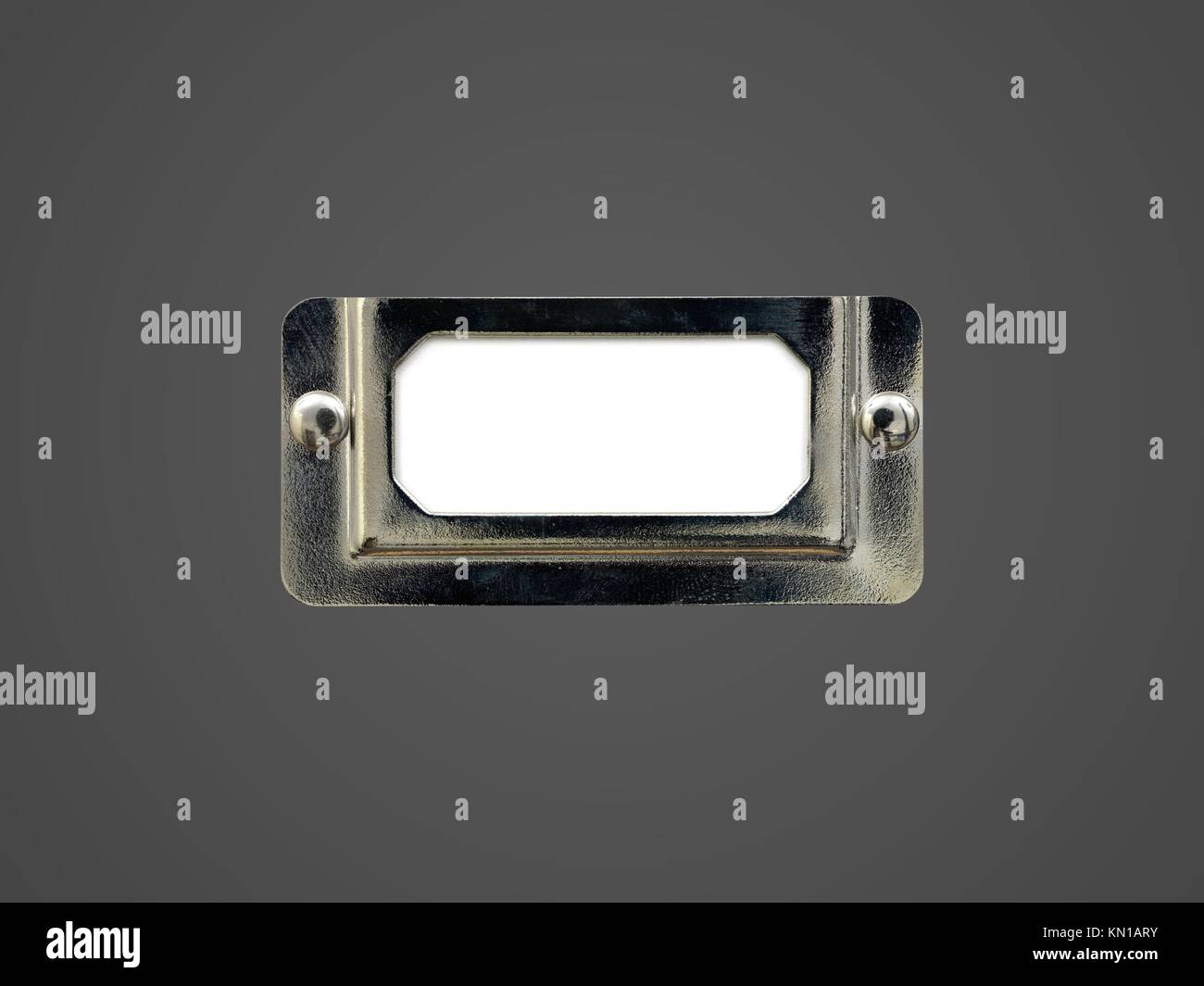 A close up image of a metal cabinet label Stock Photo - Alamy