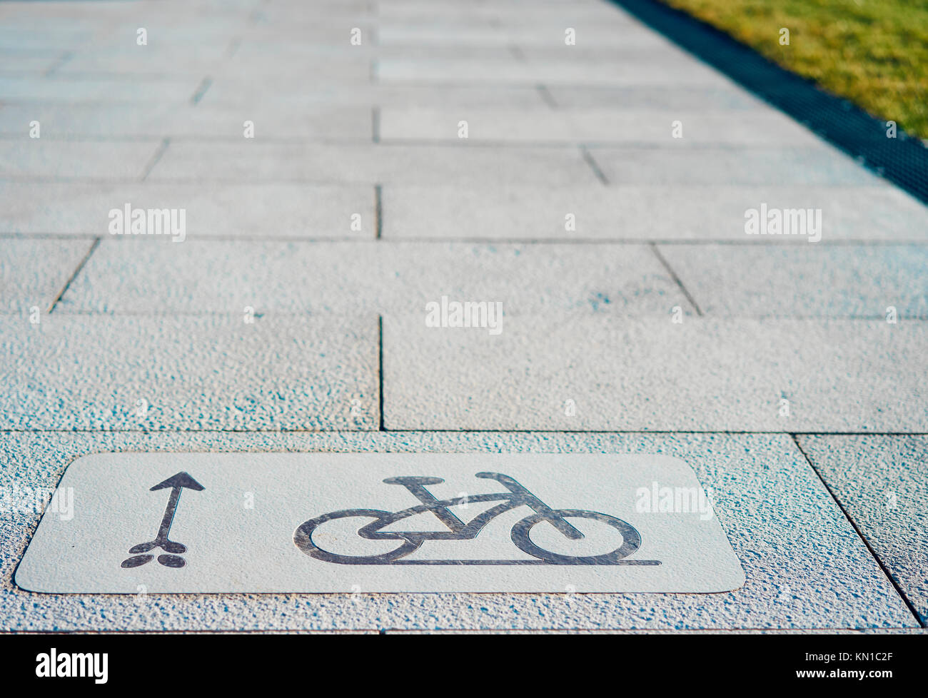 sign bike path in the Park on the tile Stock Photo - Alamy