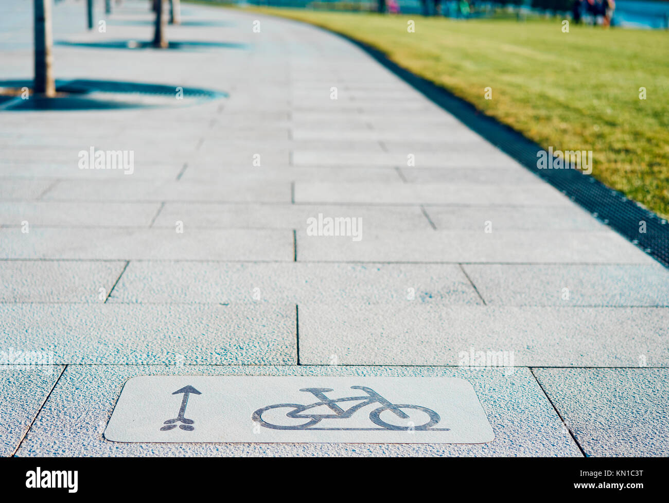 sign bike path in the Park on the tile Stock Photo - Alamy