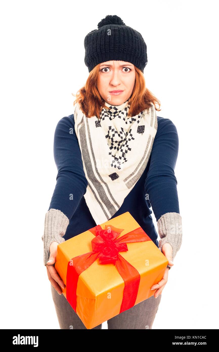 Angry disappointed woman holding gift box, isolated on white background ...