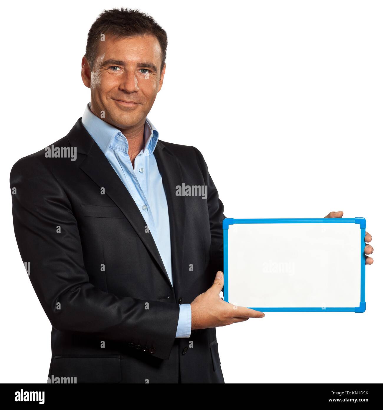 one caucasian business man holding showing whiteboard in studio ... one caucasian business man holding showing whiteboard in studio ...