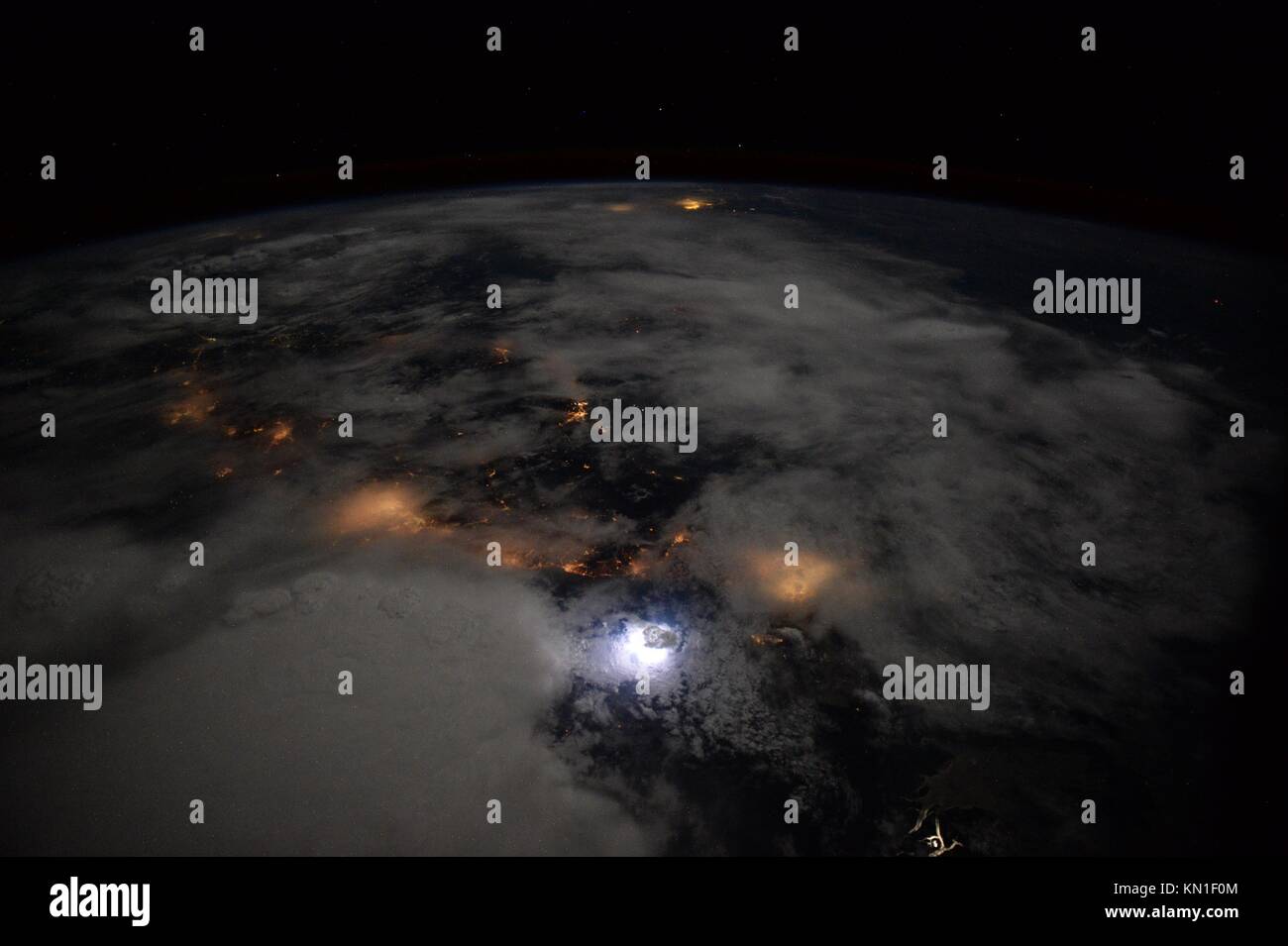 Nighttime view of lightening storms across the Earth surface seen from ...