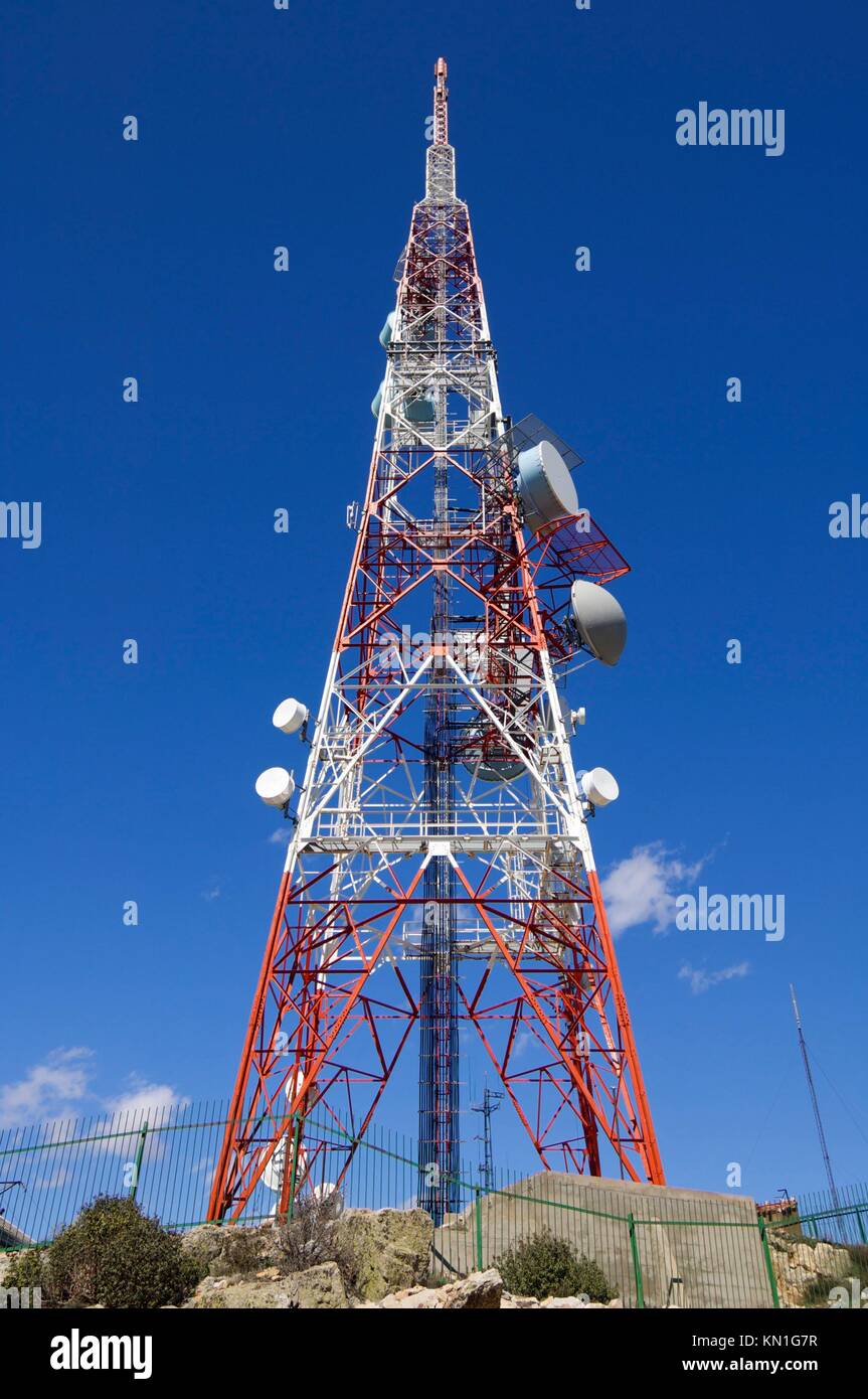telecommunications tower in white and red Stock Photo - Alamy